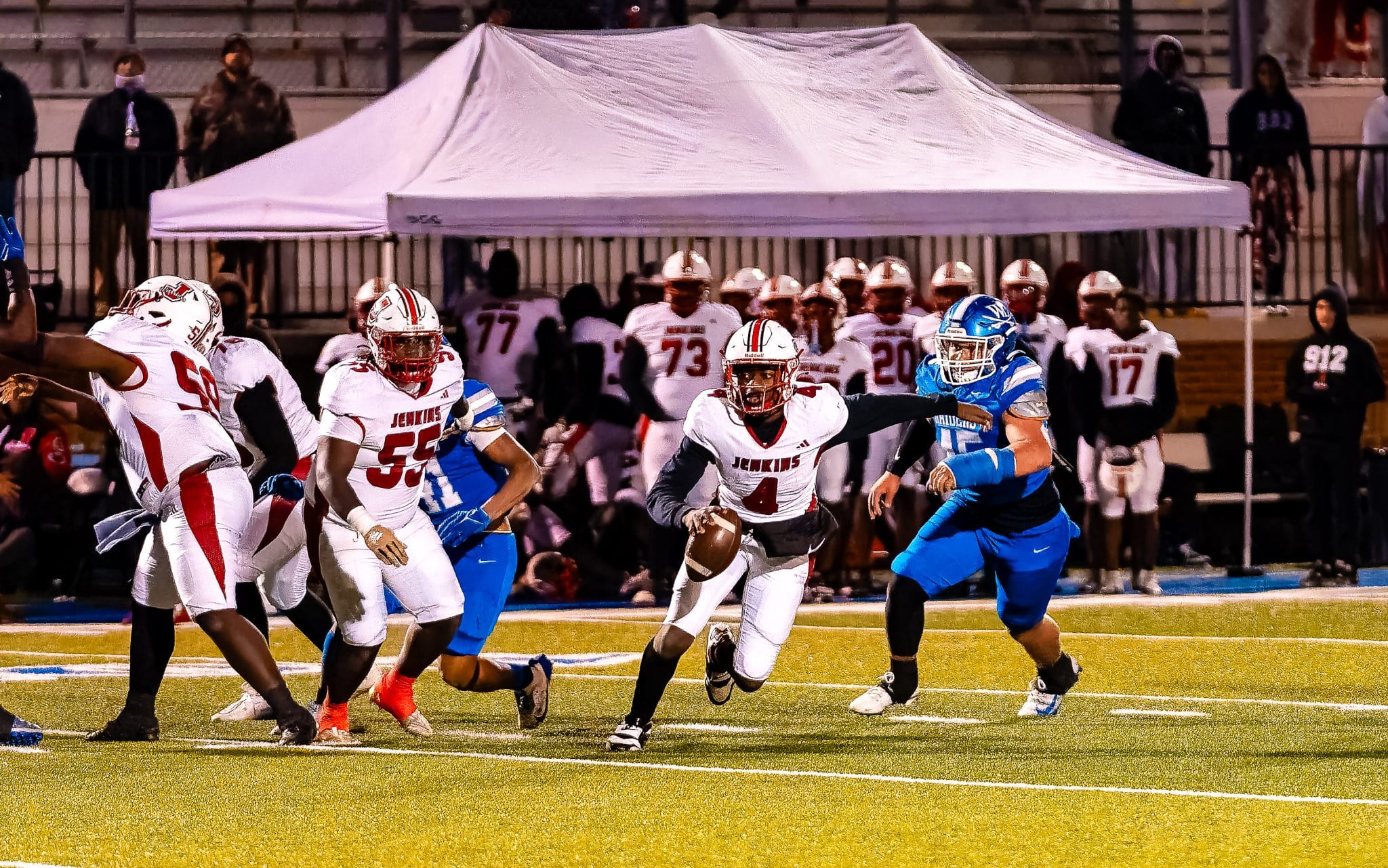FOOTBALL: Clutch TDs, key tackles help West Laurens survive trouble to ...